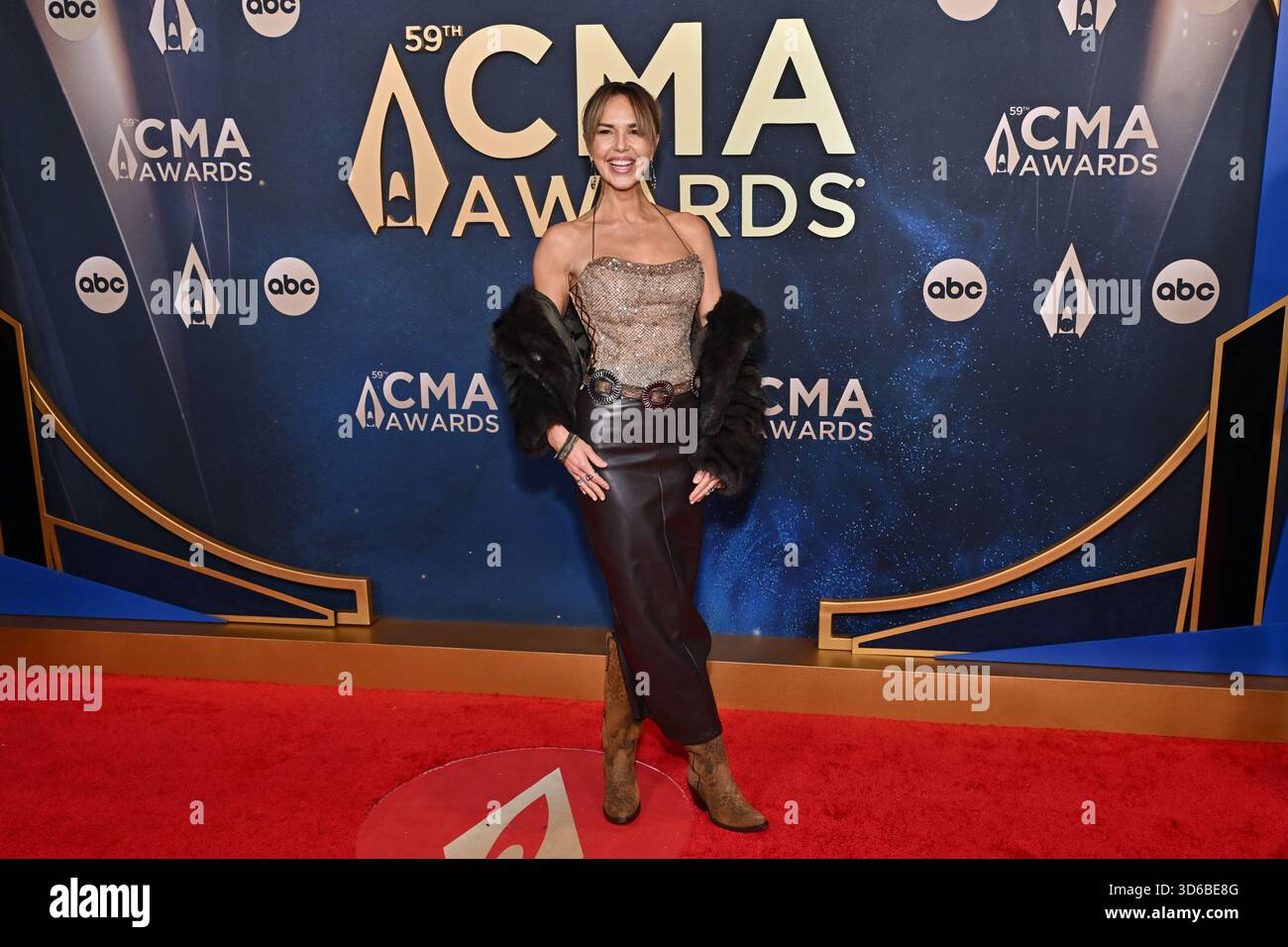 Arielle Kebbel arrives at the 59th Annual Country Music Association ...