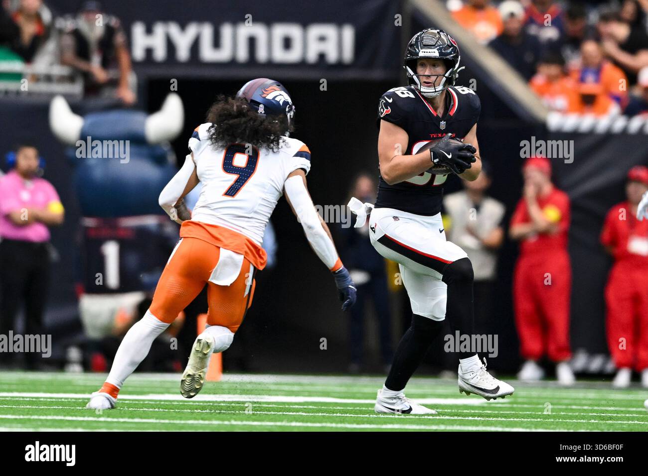 Houston Texans tight end Harrison Bryant (88) runs the ball as Denver ...