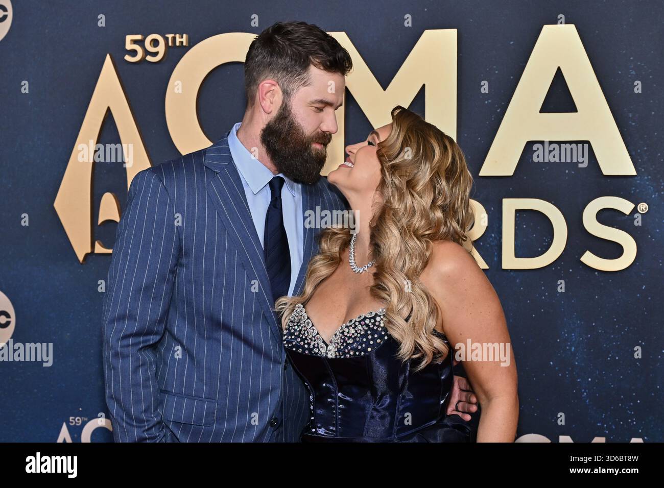 Jordan Davis, left, and Kristen O'Connor arrive at the 59th Annual ...