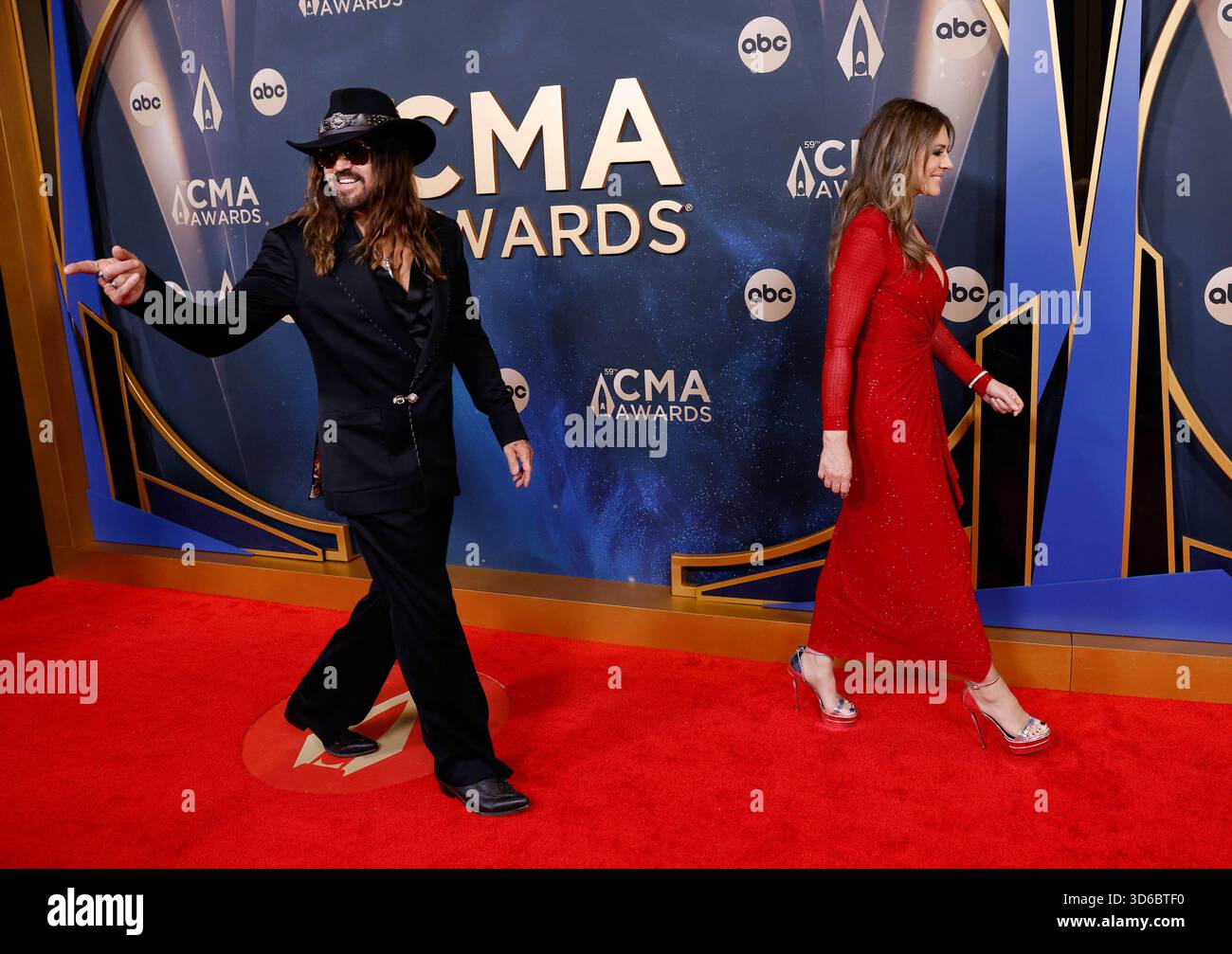 (L-R) Billy Ray Cyrus and Elizabeth Hurley arrive on the red carpet for ...