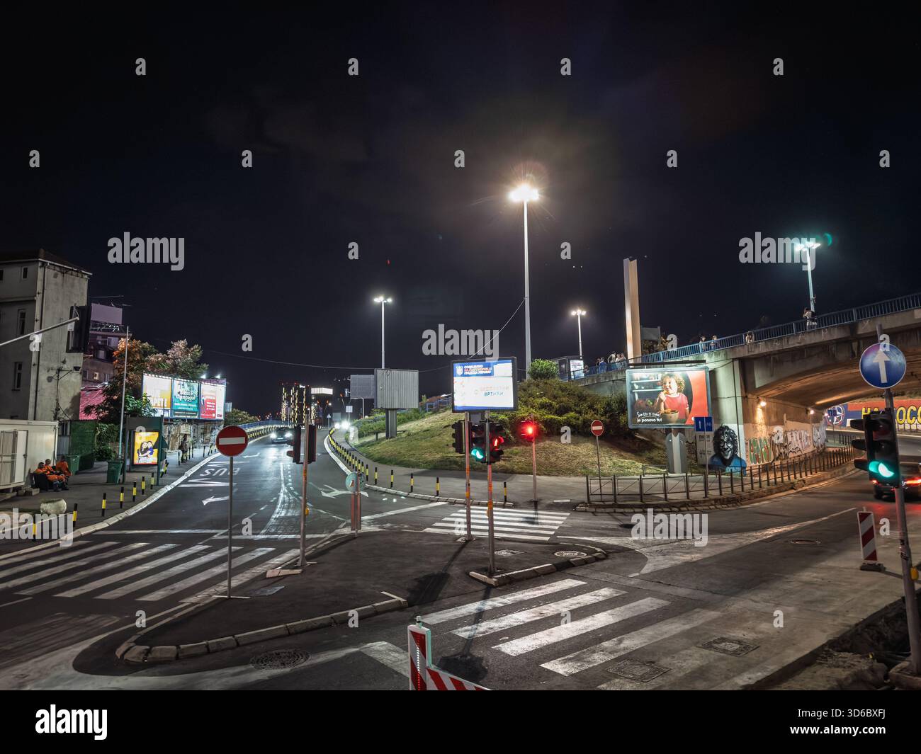 BELGRADE, SPAIN - AUGUST 16, 2025: Night view of a road interchange on ...