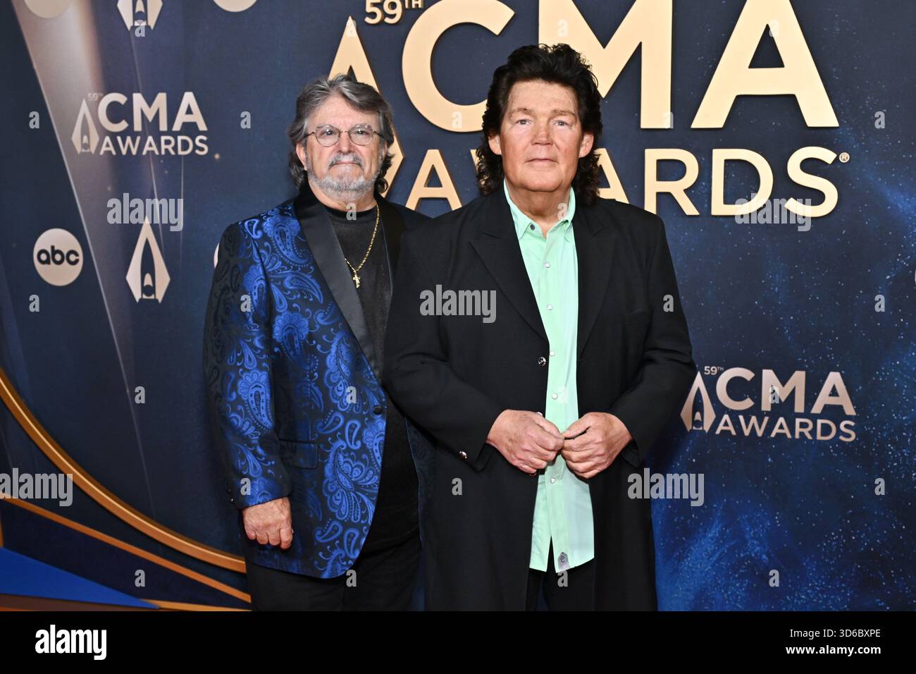 Mike McGuire, left, and Marty Raybon arrive at the 59th Annual Country ...
