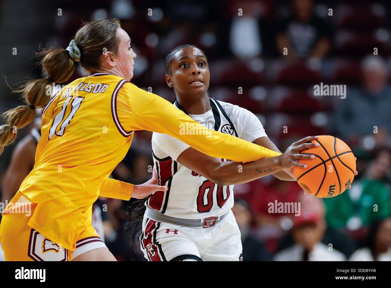 South Carolina guard Ta'Niya Latson, right, keeps the ball from ...