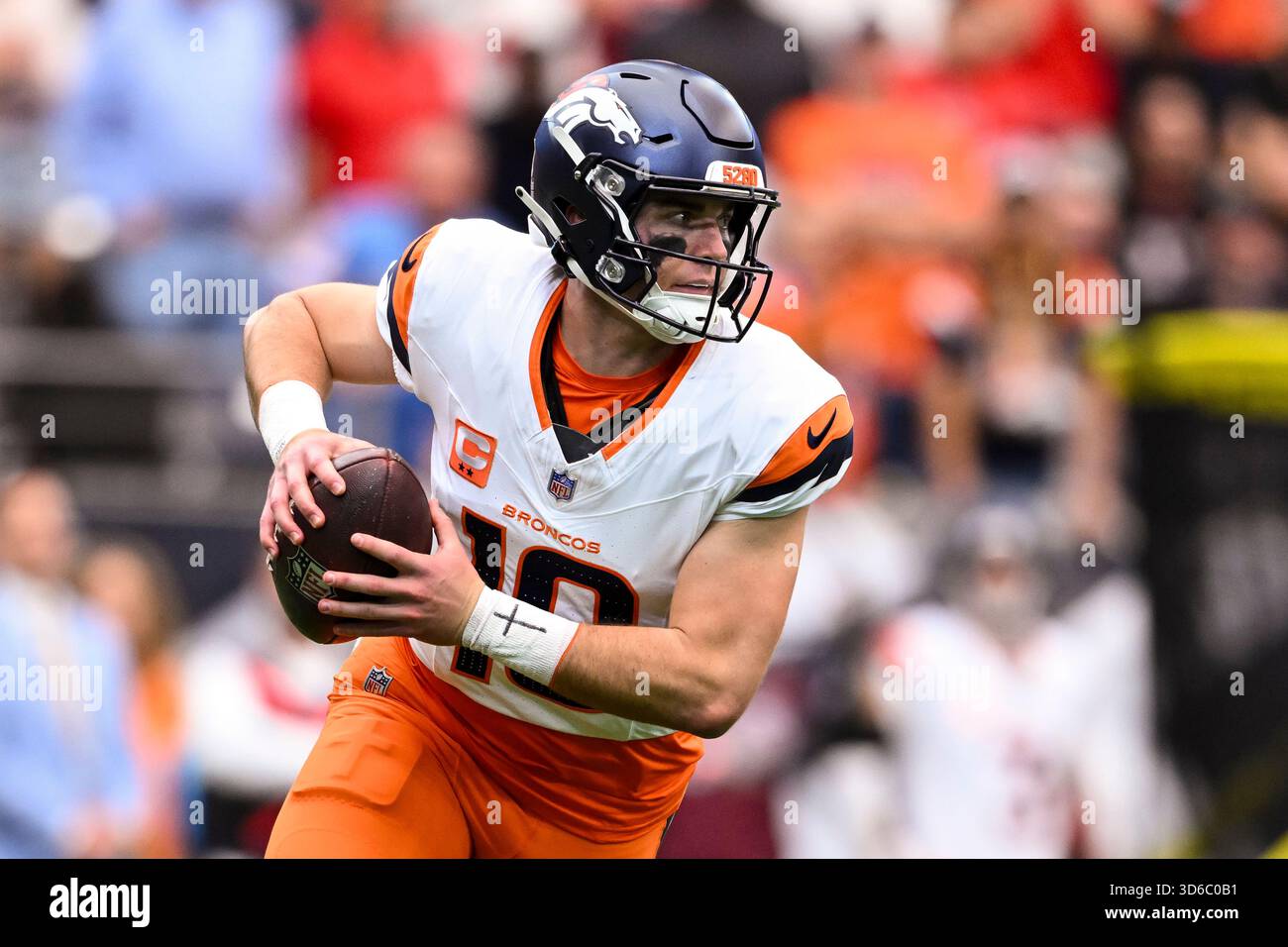 Denver Broncos quarterback Bo Nix (10) looks to pass the ball during ...