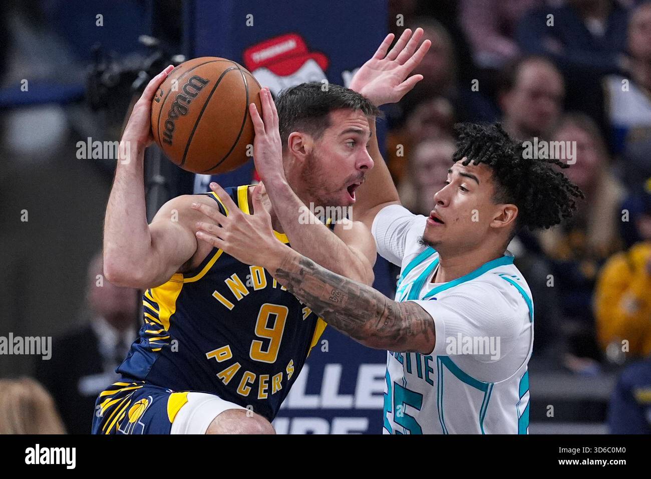 Charlotte Hornets guard Kj Simpson (25) defends Indiana Pacers guard T ...