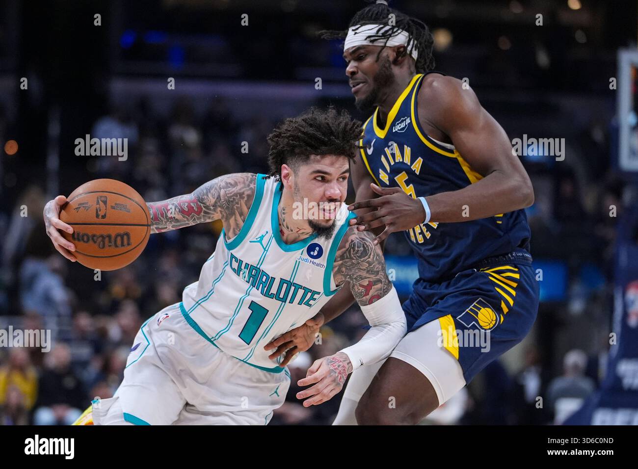 Charlotte Hornets guard Lamelo Ball (1) drives on Indiana Pacers ...