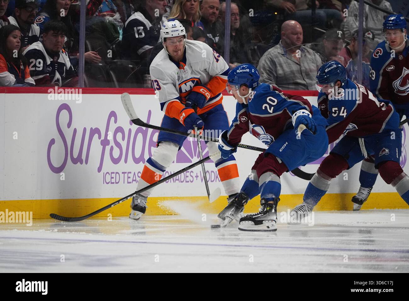 New York Islanders center Mathew Barzal (13) passes the puck as ...