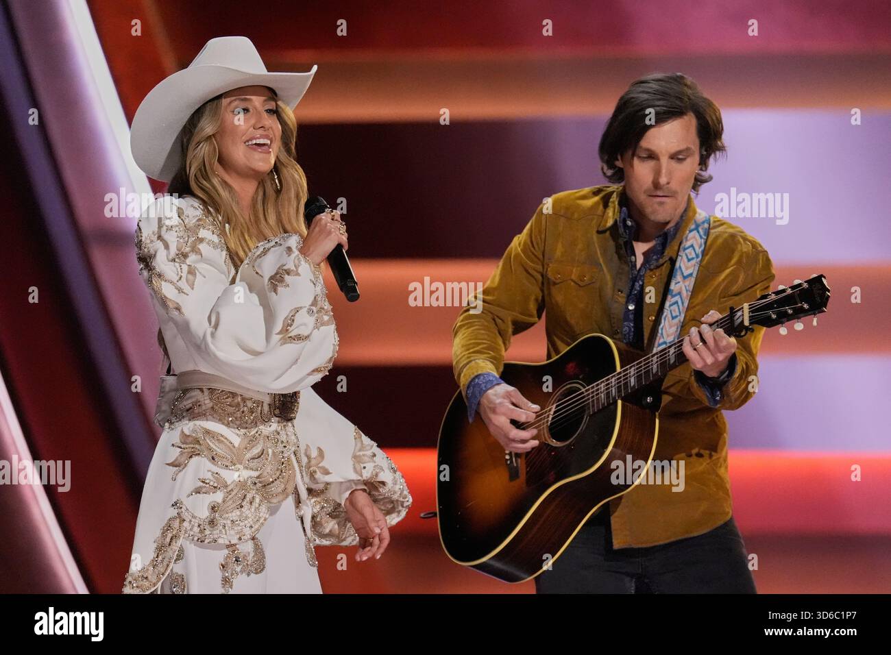 Host Lainey Wilson, left, and Charlie Worsham perform during the 59th ...