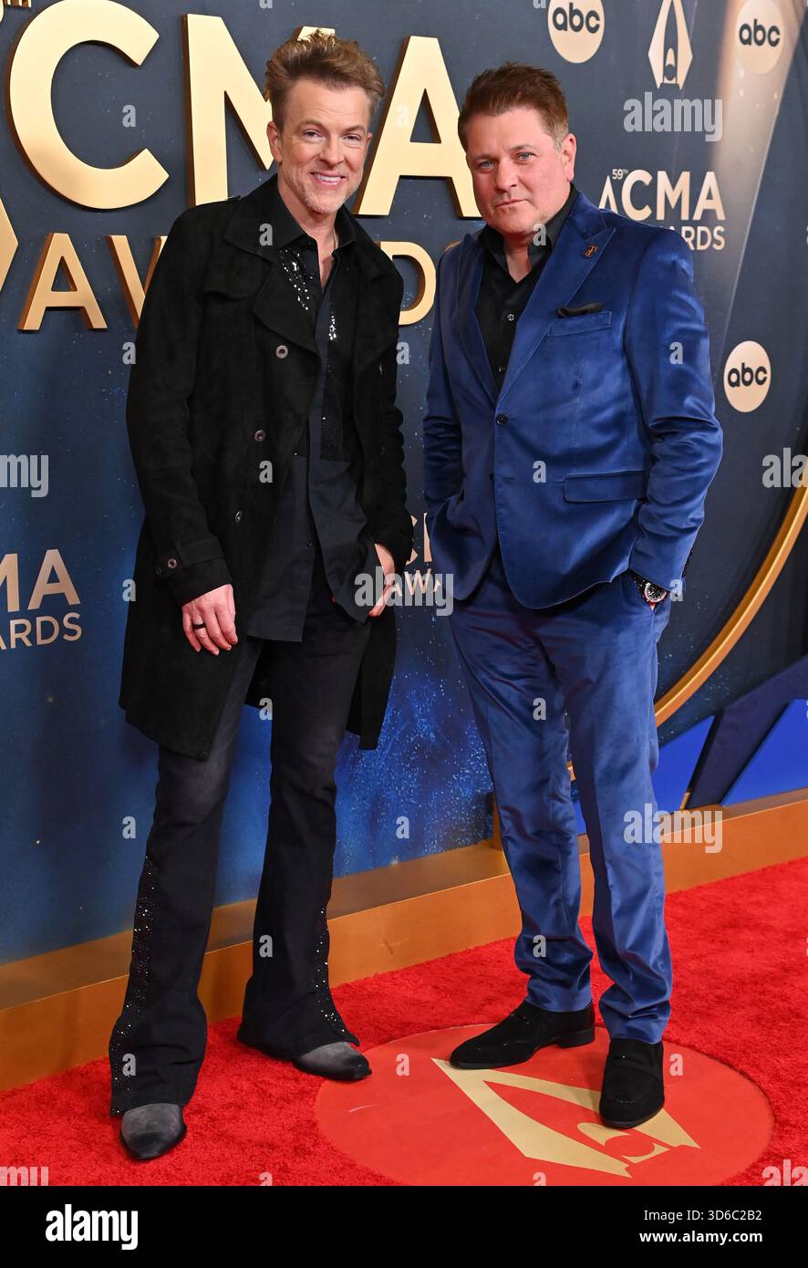 Joe Don Rooney and Jay DeMarcus from Rascal Flatts arriving at the 59th Annual Country Music ...