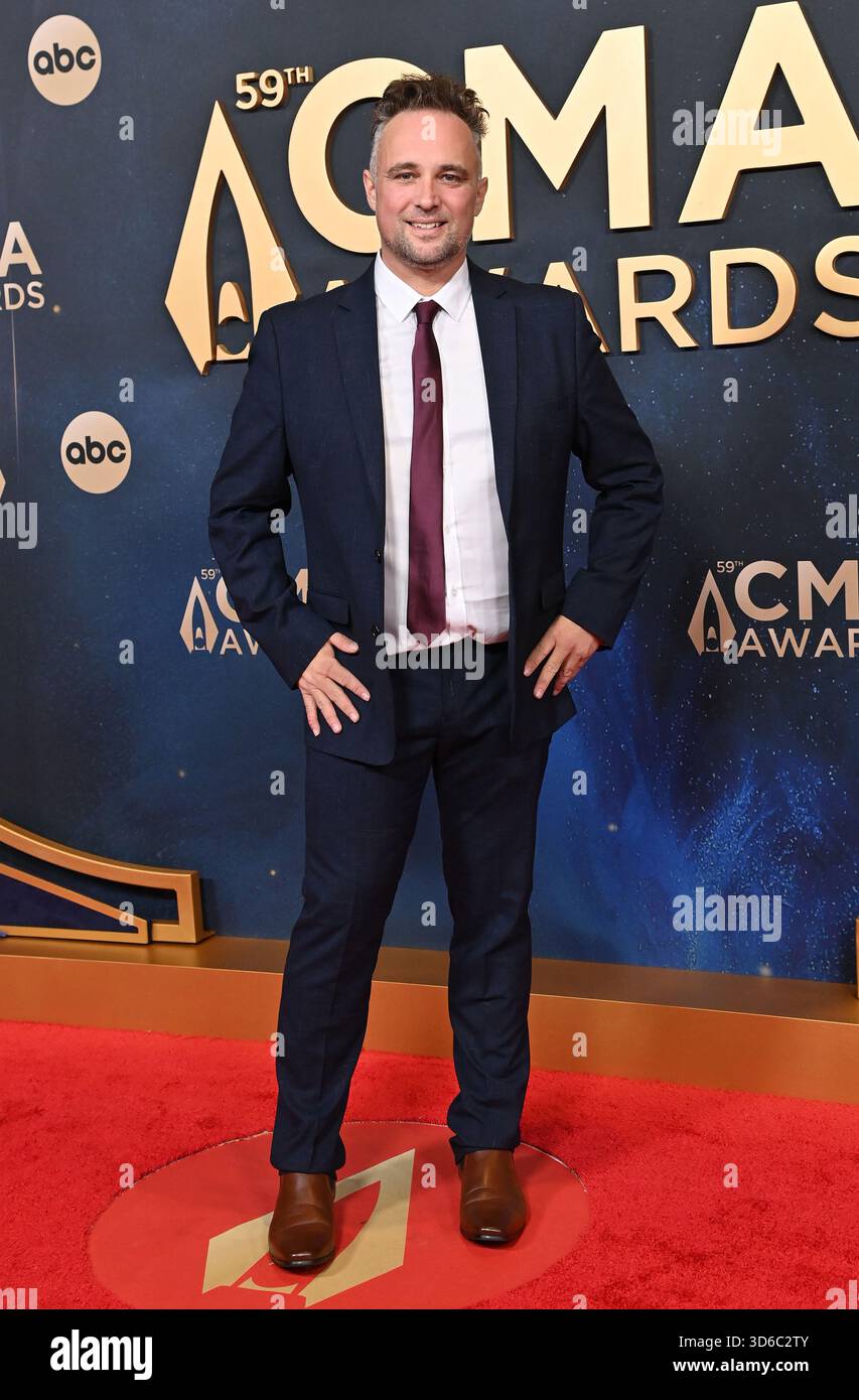 Justin Thomson arriving at the 59th Annual Country Music Association ...