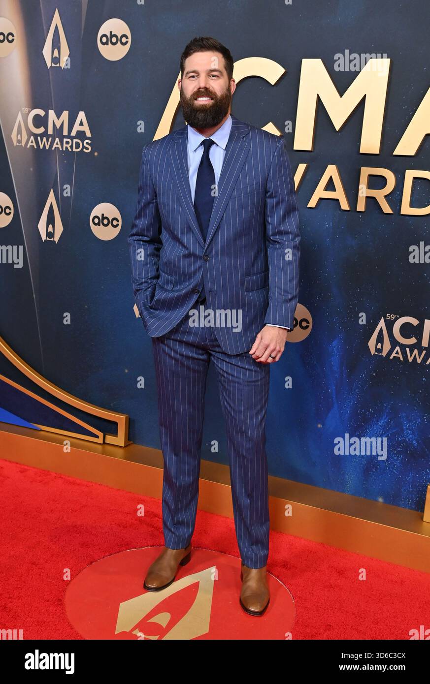Jordan Davis arriving at the 59th Annual Country Music Association ...
