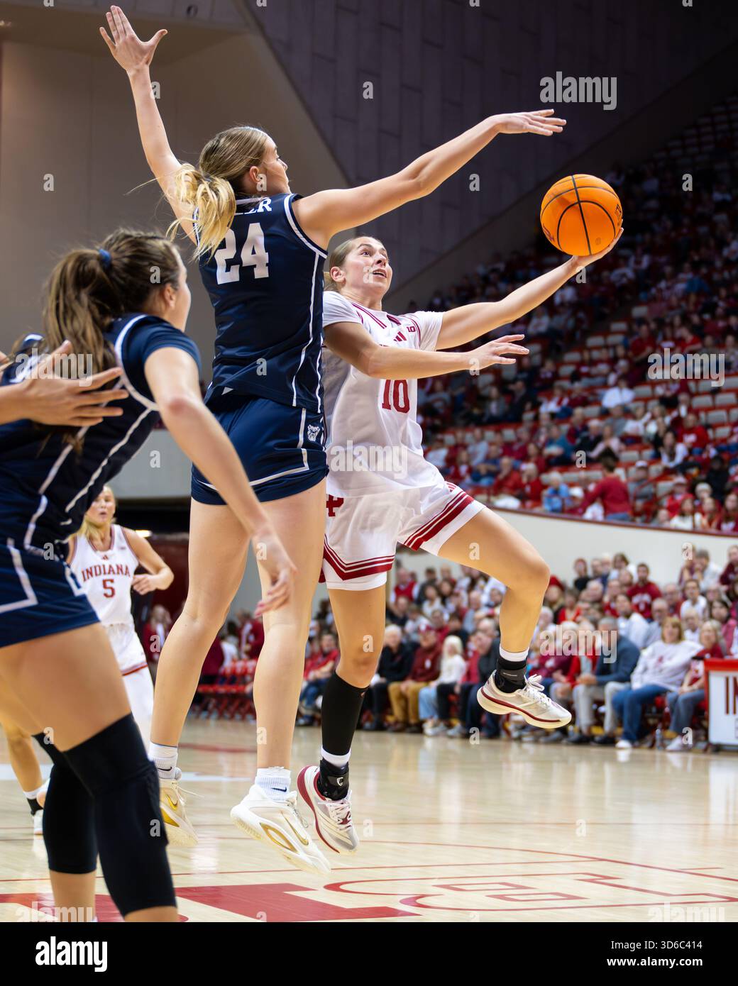 Indiana guard Shay Ciezki (10) shoots while being defended by Butler ...