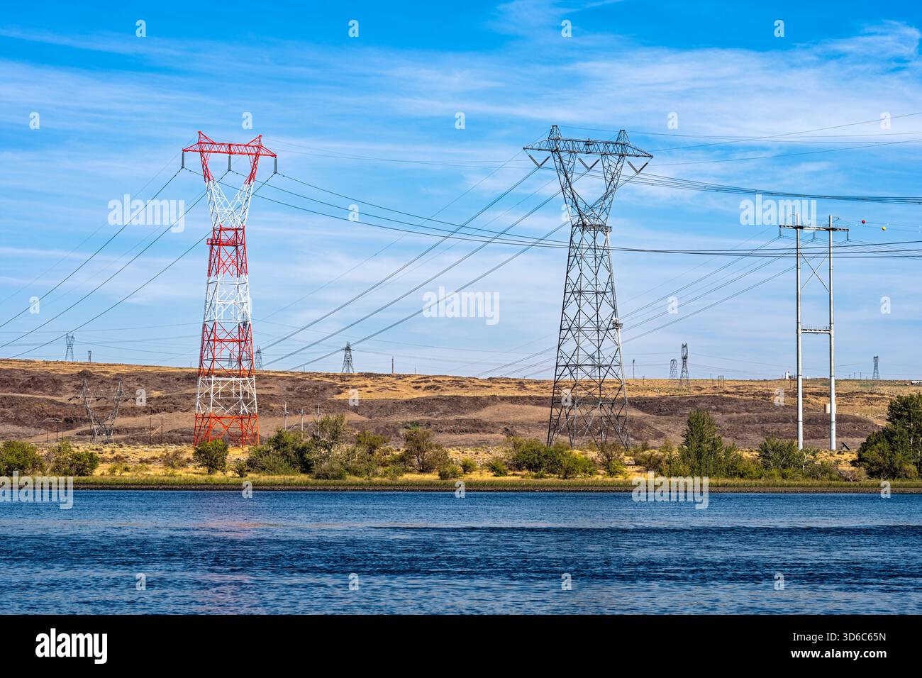 Transmission lines running across the Columbia River carry electricity ...