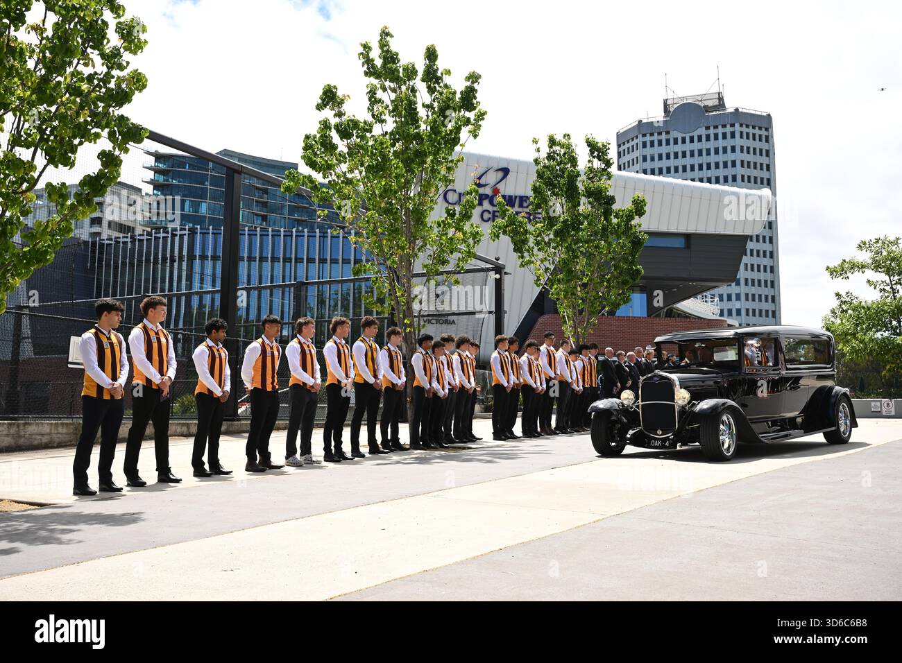 A guard of honour takes place as the hearse departs the funeral of Ben ...