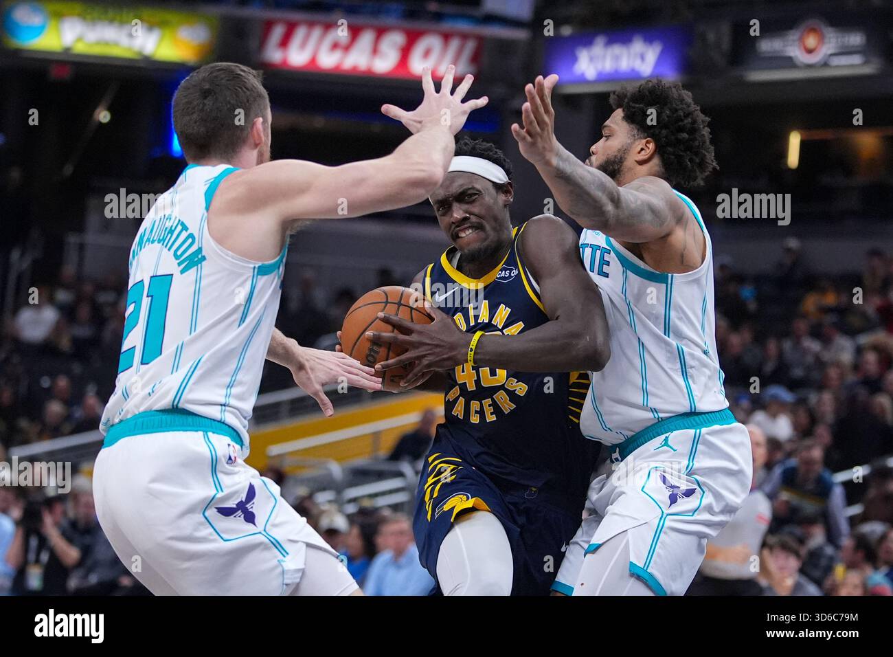 Indiana Pacers forward Pascal Siakam (43) drives between Charlotte ...