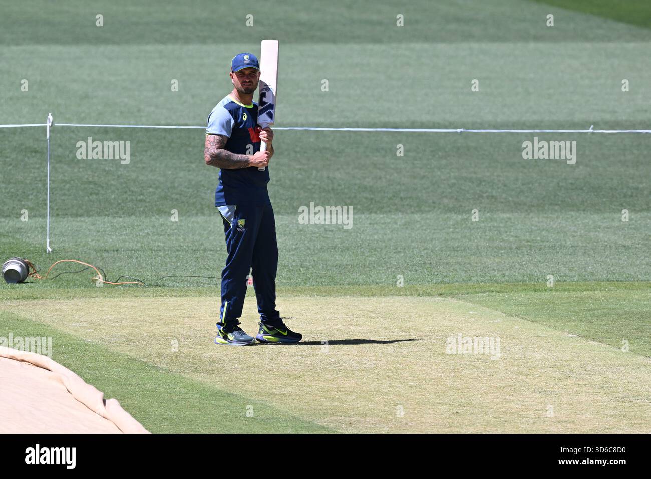 Jake Weatherald inspects the pitch ahead of the first Ashes Test at ...