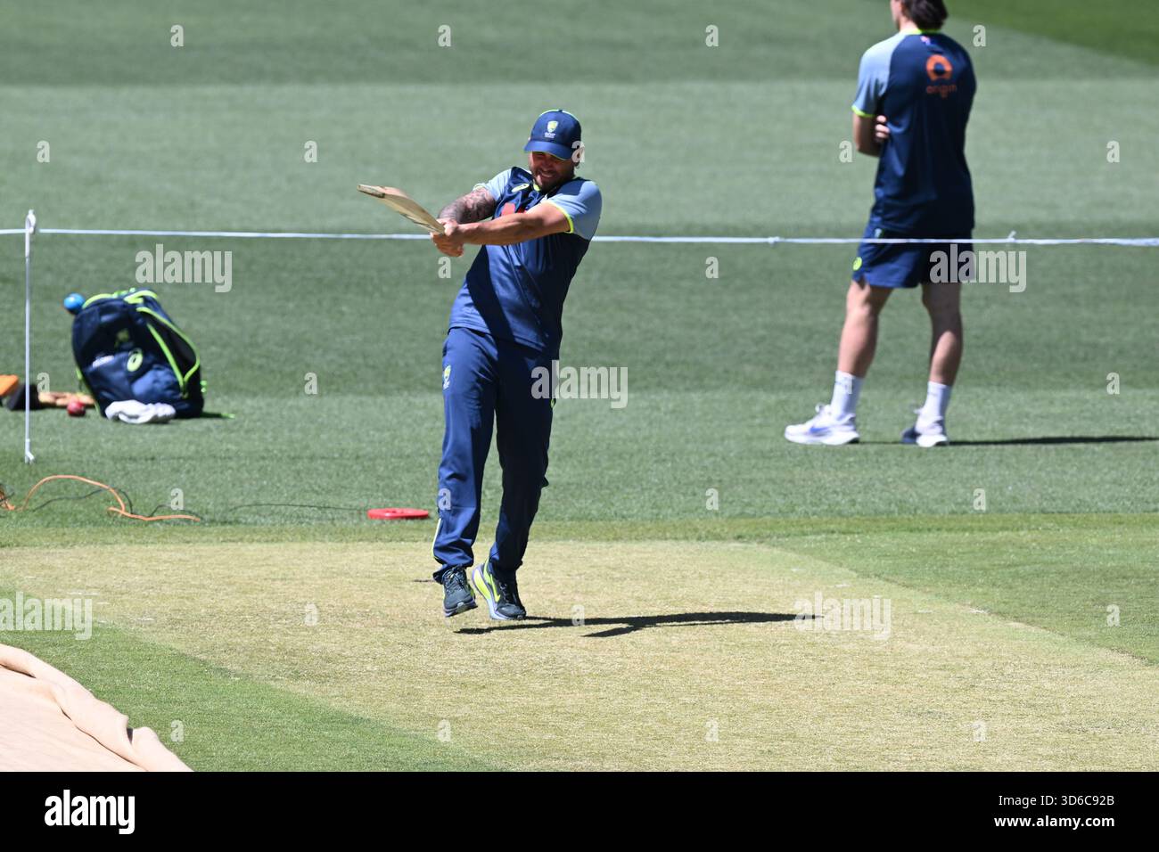 Jake Weatherald inspects the pitch ahead of the first Ashes Test at ...