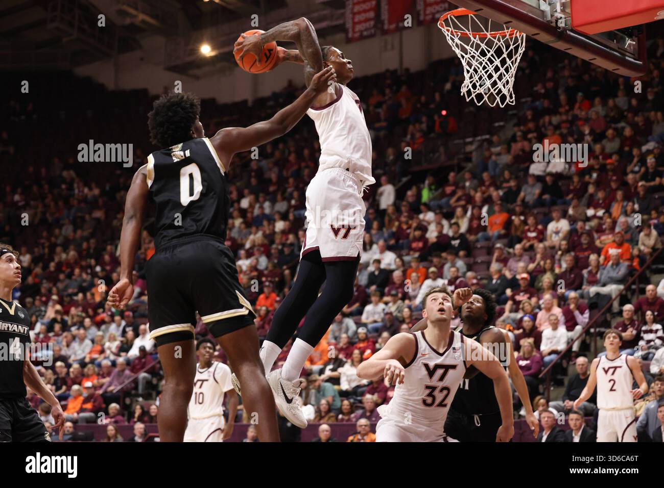 November 19, 2025: Virginia Tech Hokies forward Tobi Lawal (1) dunks ...