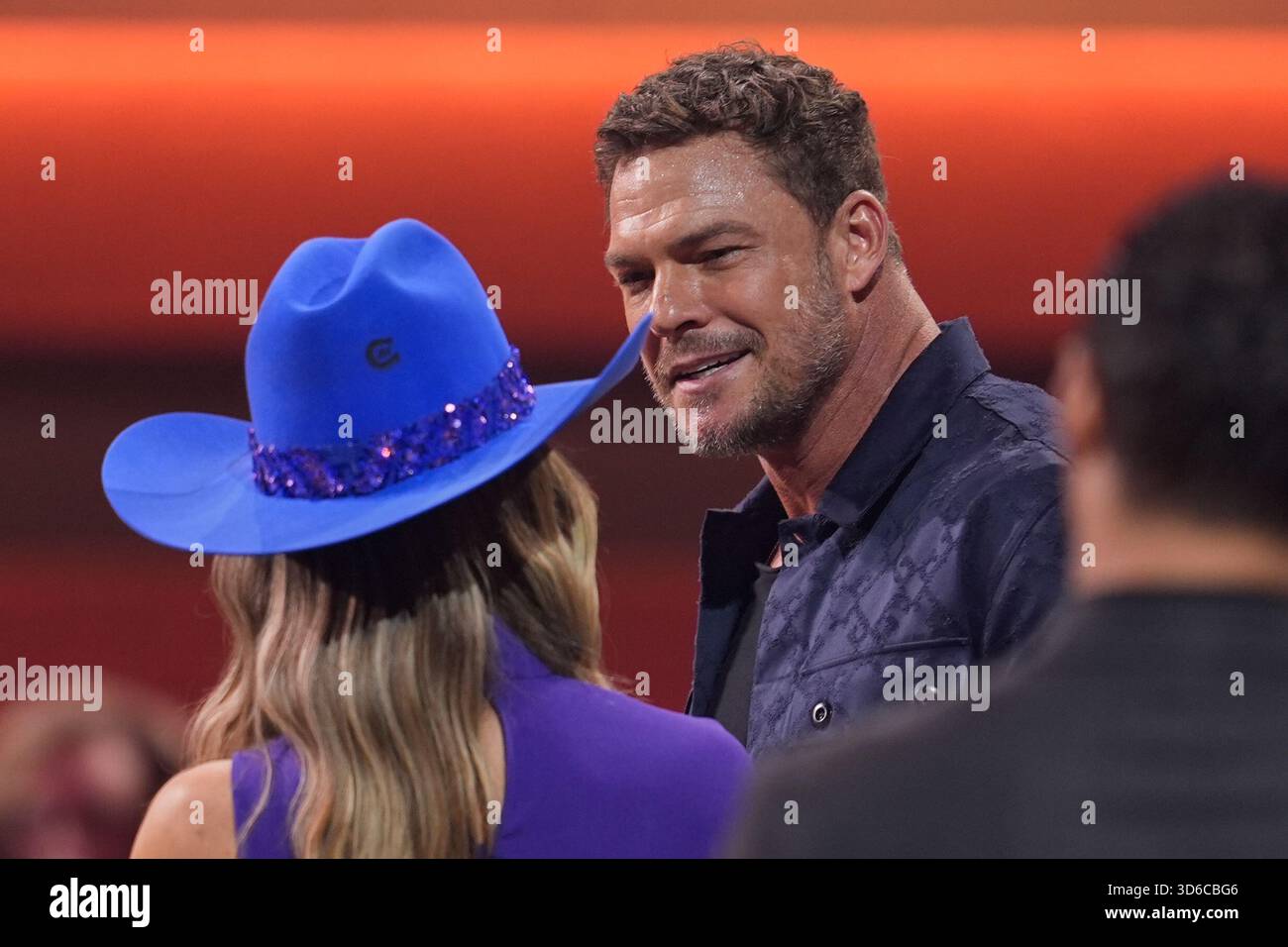 Host Lainey Wilson, left, and Alan Ritchson during the 59th Annual ...