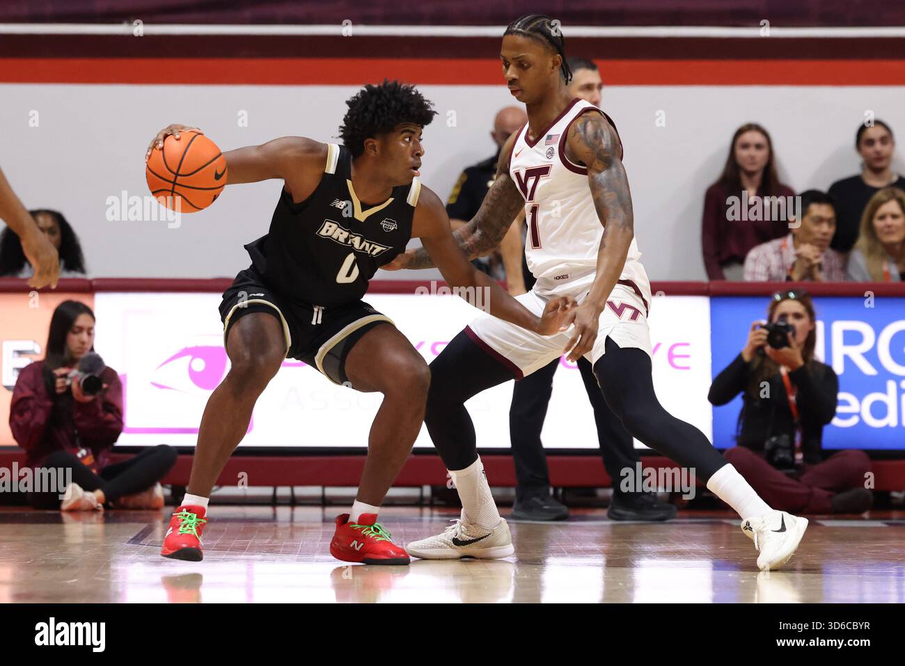 November 19, 2025: Bryant Bulldogs forward Ashley Sims II (0) guarded ...