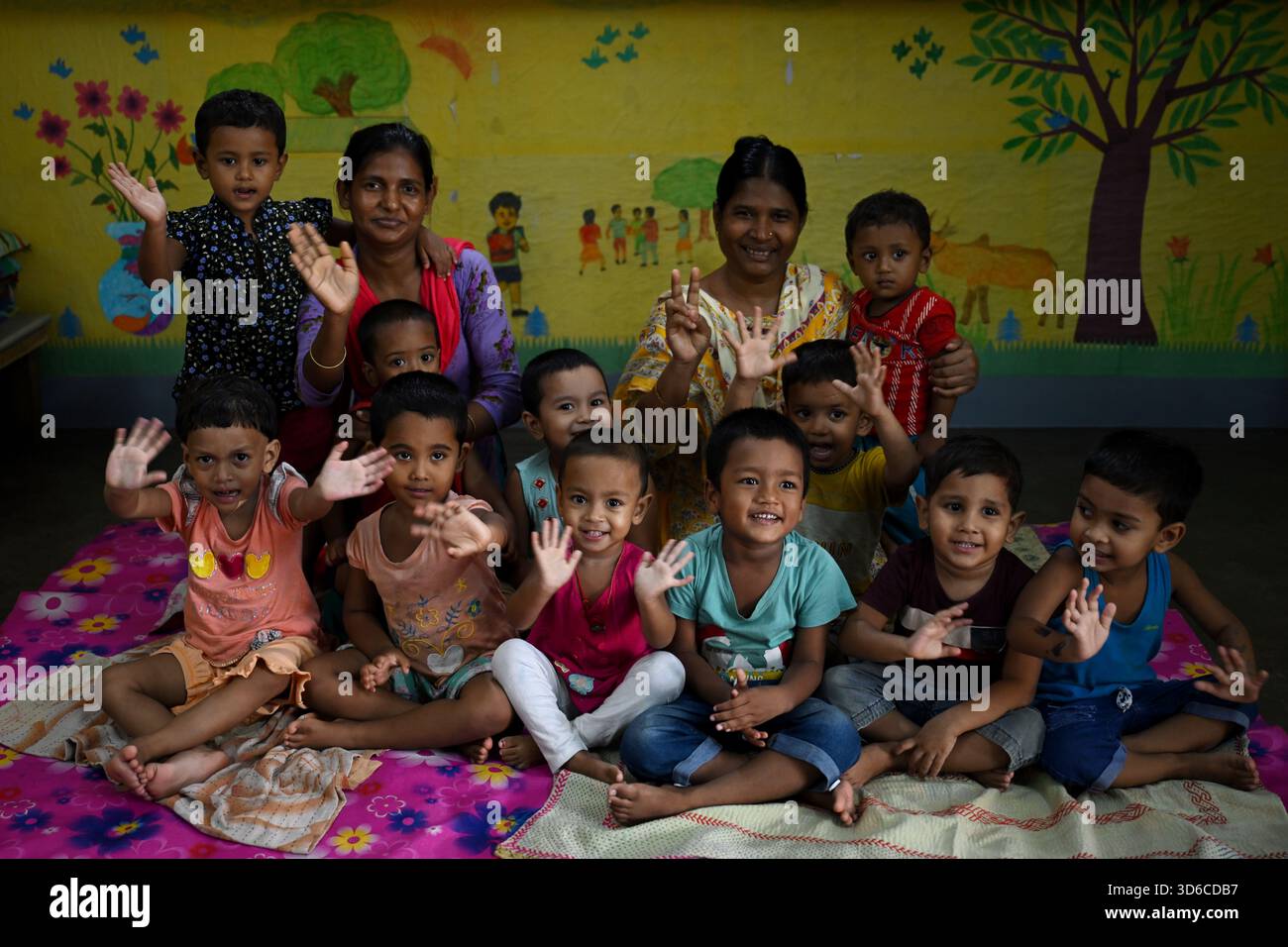 June 1, 2025, Dhaka, Bangladesh: Children of the Mamata Day Care Center play joyfully under the ...