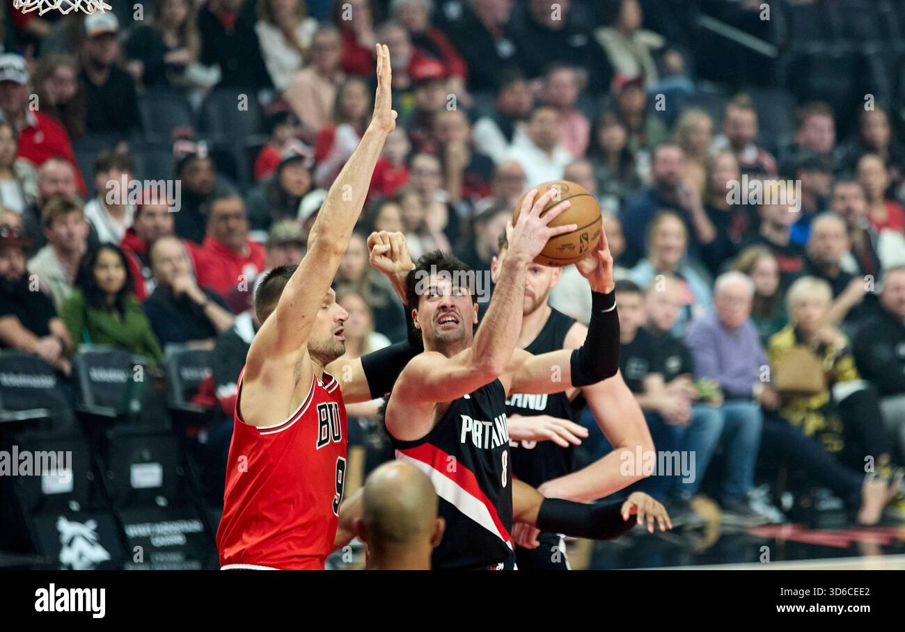 Portland Trail Blazers forward Deni Avdija, right, shoots over Chicago ...