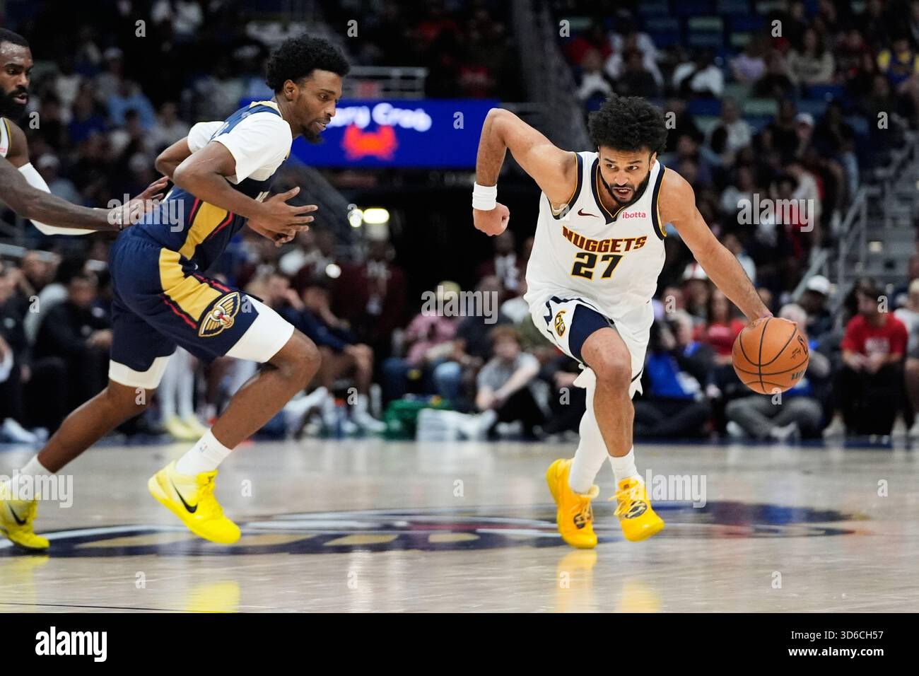 Denver Nuggets guard Jamal Murray (27) races down court past New ...