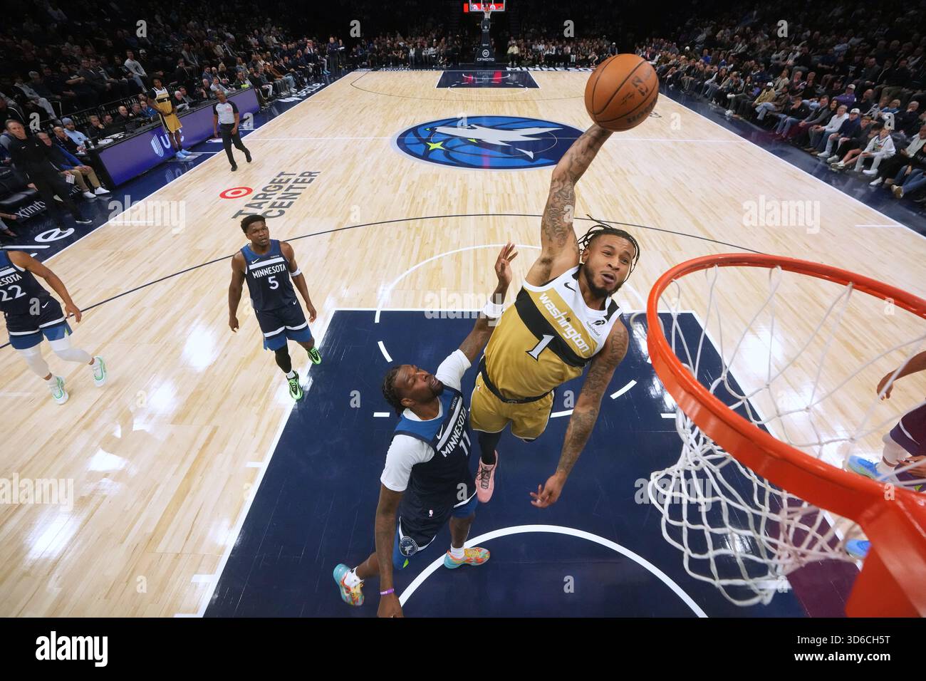 Washington Wizards forward Cam Whitmore (1) goes up for a dunk as ...