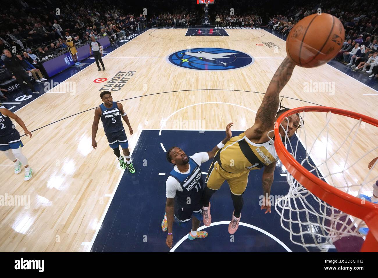 Washington Wizards forward Cam Whitmore (1) goes up for a dunk as ...