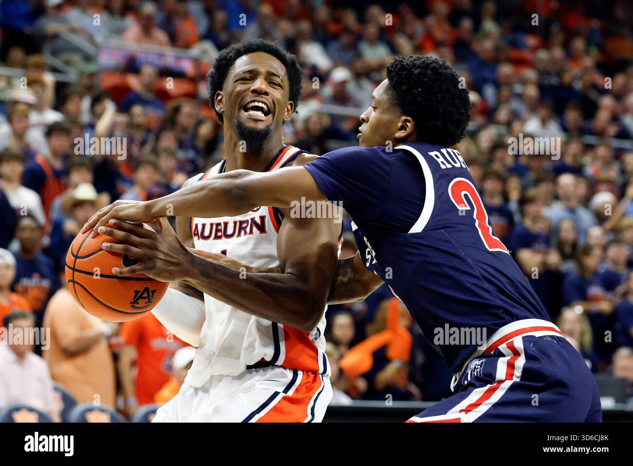 Auburn guard Kevin Overton (1) is fouled by Jackson State guard Daeshun ...
