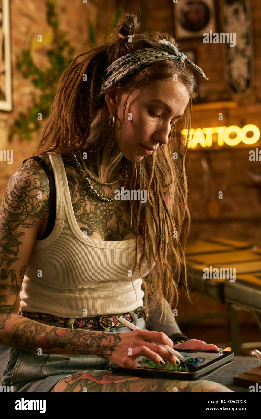 Professional woman with visible tattoos hi-res stock photography and ...