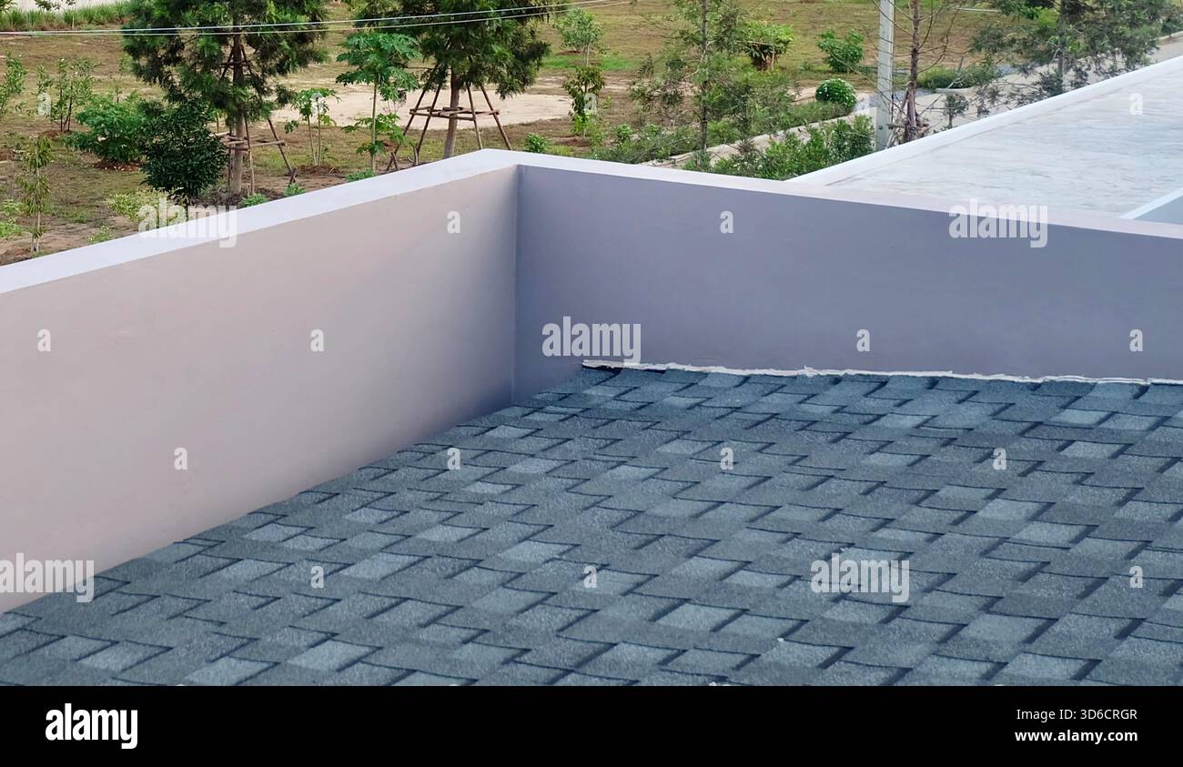 Abstract View of Green Shingle Roof and Parapet Wall Stock Photo - Alamy
