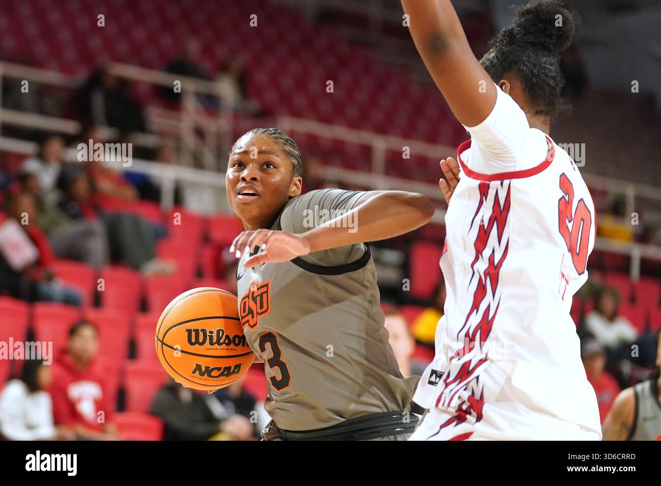 Oklahoma State guard Micah Gray (3) looks to take a shot during an NCAA ...