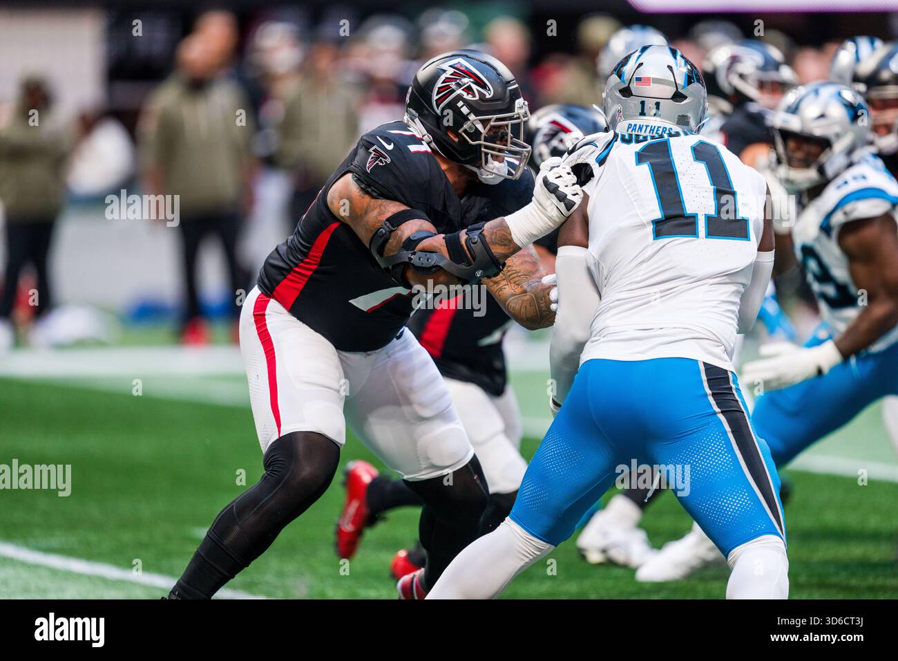 Atlanta Falcons offensive tackle Elijah Wilkinson (71) works against ...