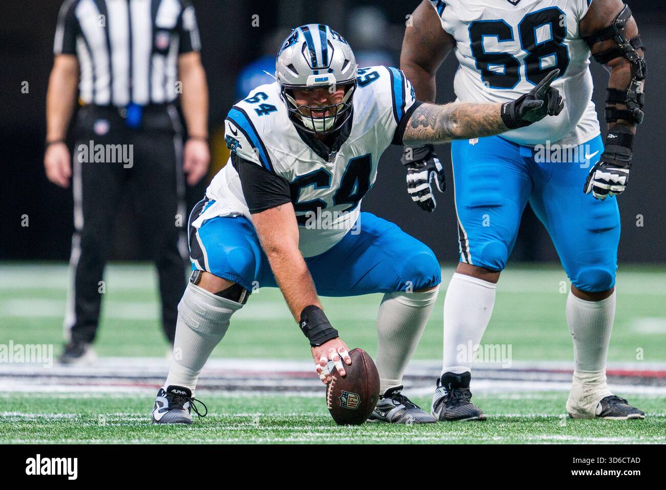 Carolina Panthers center Cade Mays (64) signals during the second half ...