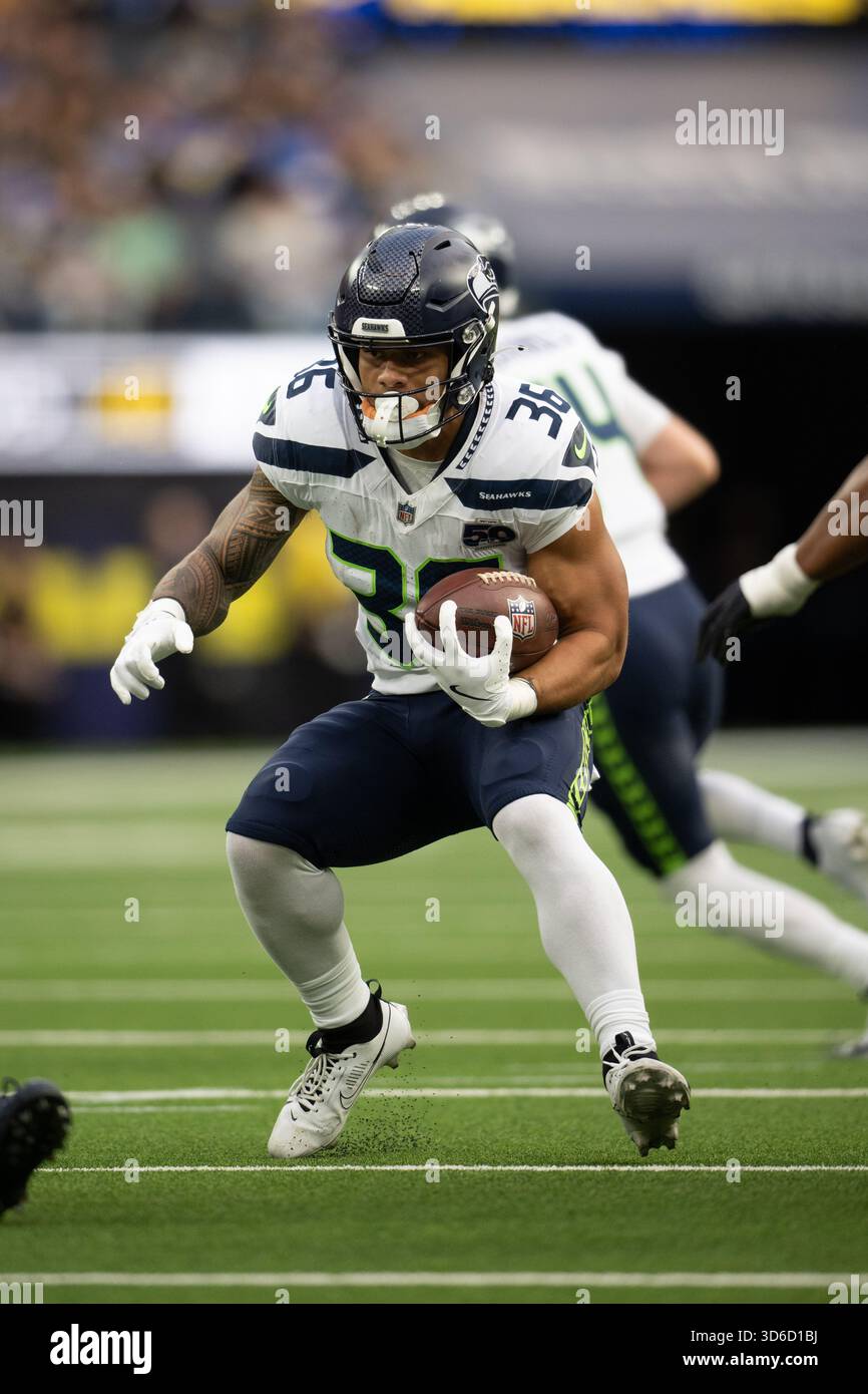 Seattle Seahawks running back George Holani (36) runs with the ball ...