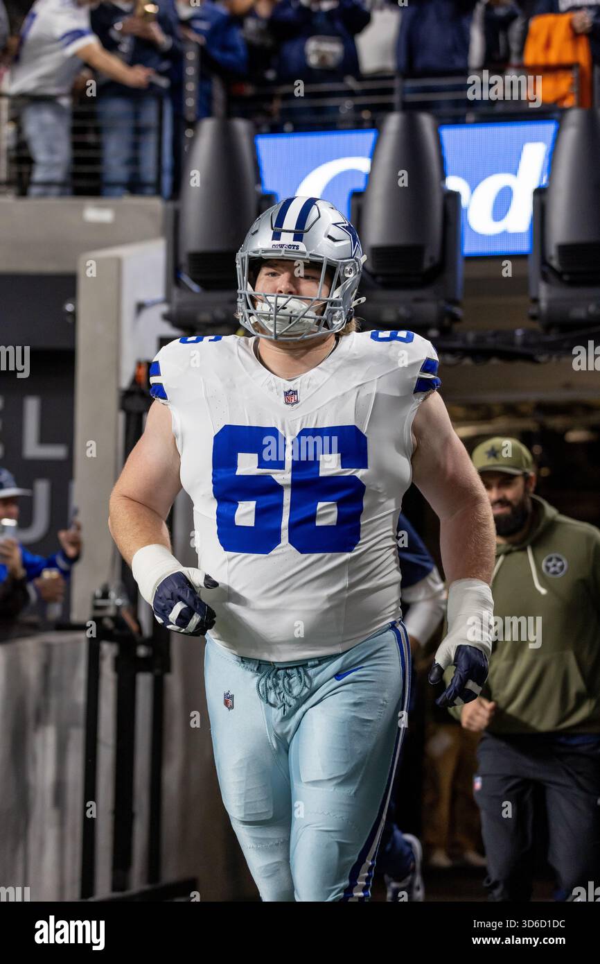 Dallas Cowboys guard T.J. Bass (66) enters the field before the playing ...