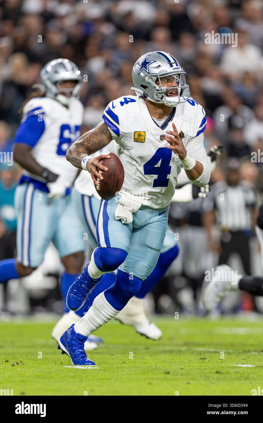 Dallas Cowboys quarterback Dak Prescott (4) rolls out against the Las ...
