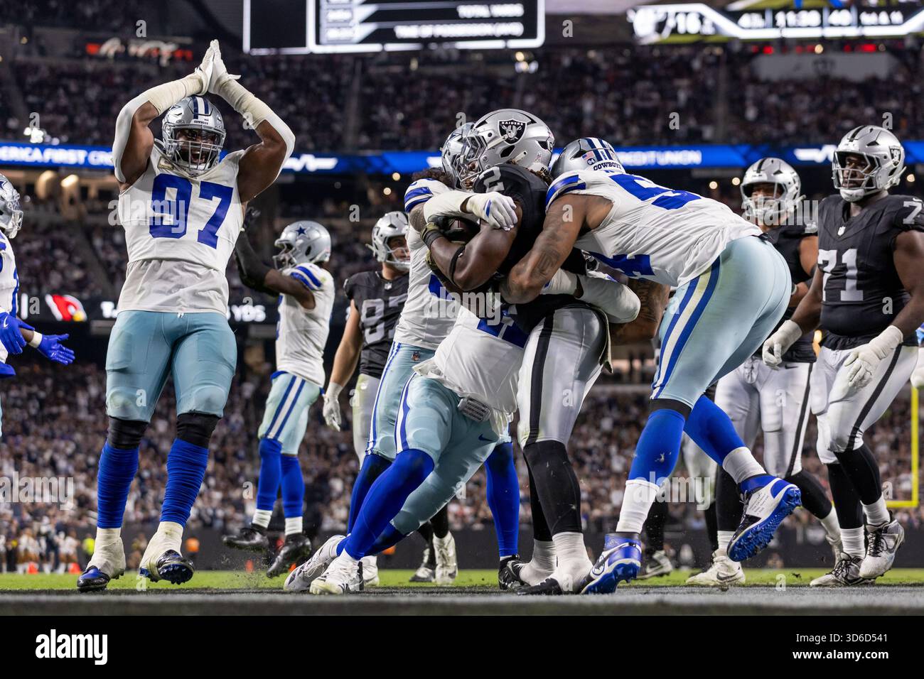Dallas Cowboys defensive tackle Osa Odighizuwa (97) signals safety as ...