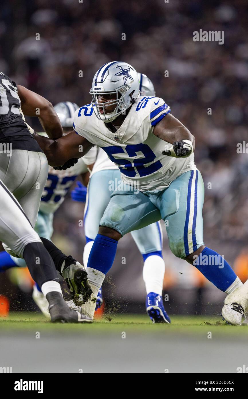 Dallas Cowboys guard Tyler Booker (52) blocks against the Las Vegas ...