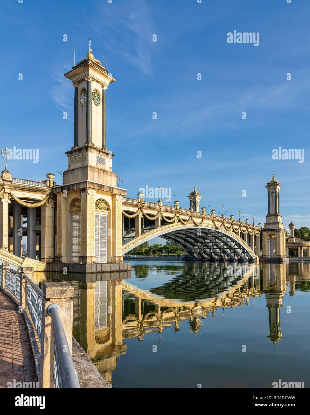 Grand Seri Gemilang Bridge with ornate towers and clock faces ...
