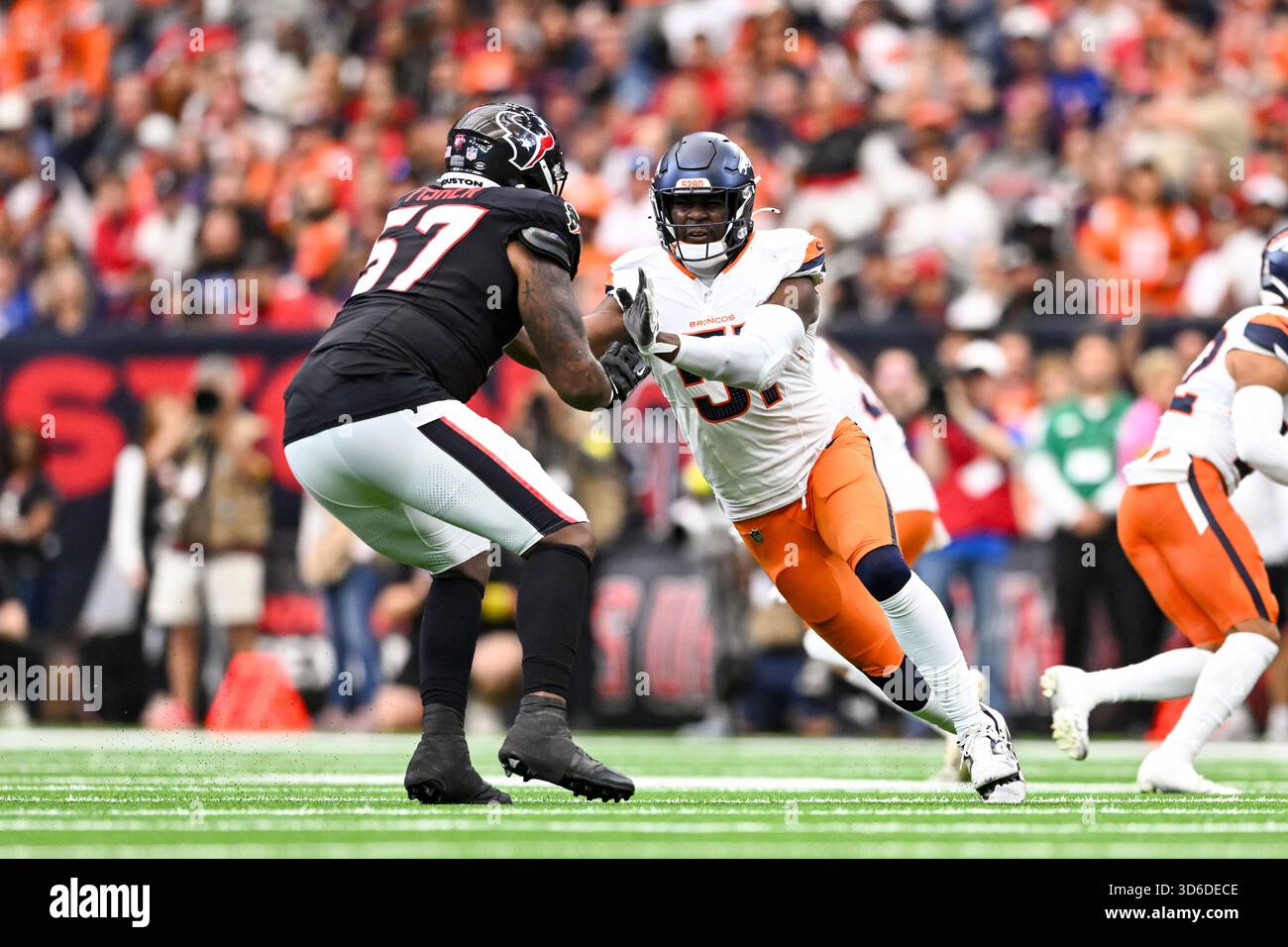 Denver Broncos linebacker Que Robinson (51) defends in coverage as ...