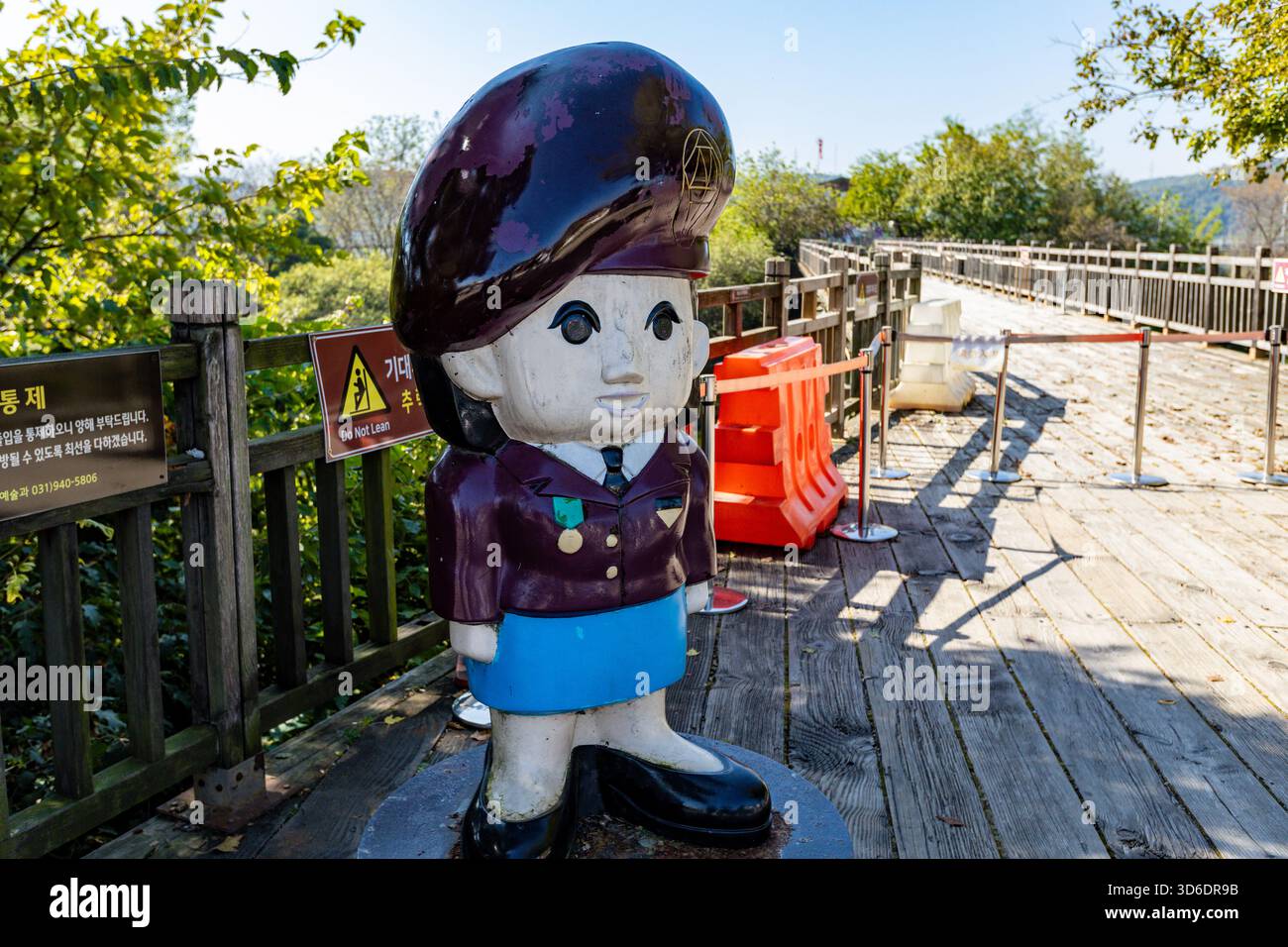 Decorative statues of border officer on the border between North and ...