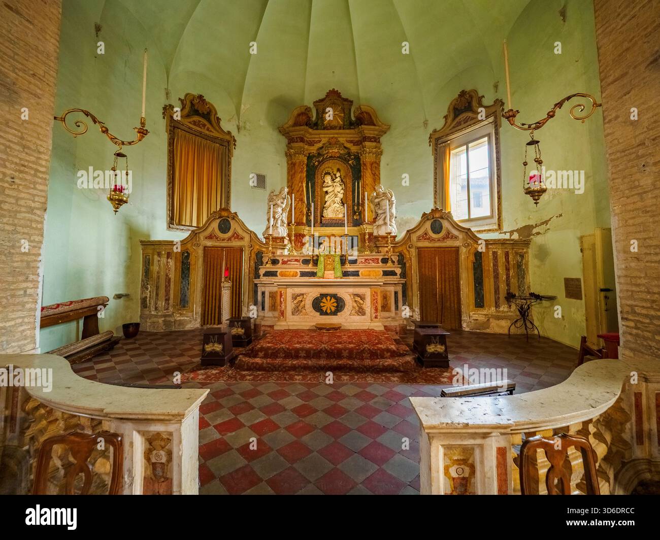 Main altar, made of polychrome marbles and surmounted by the statue of ...