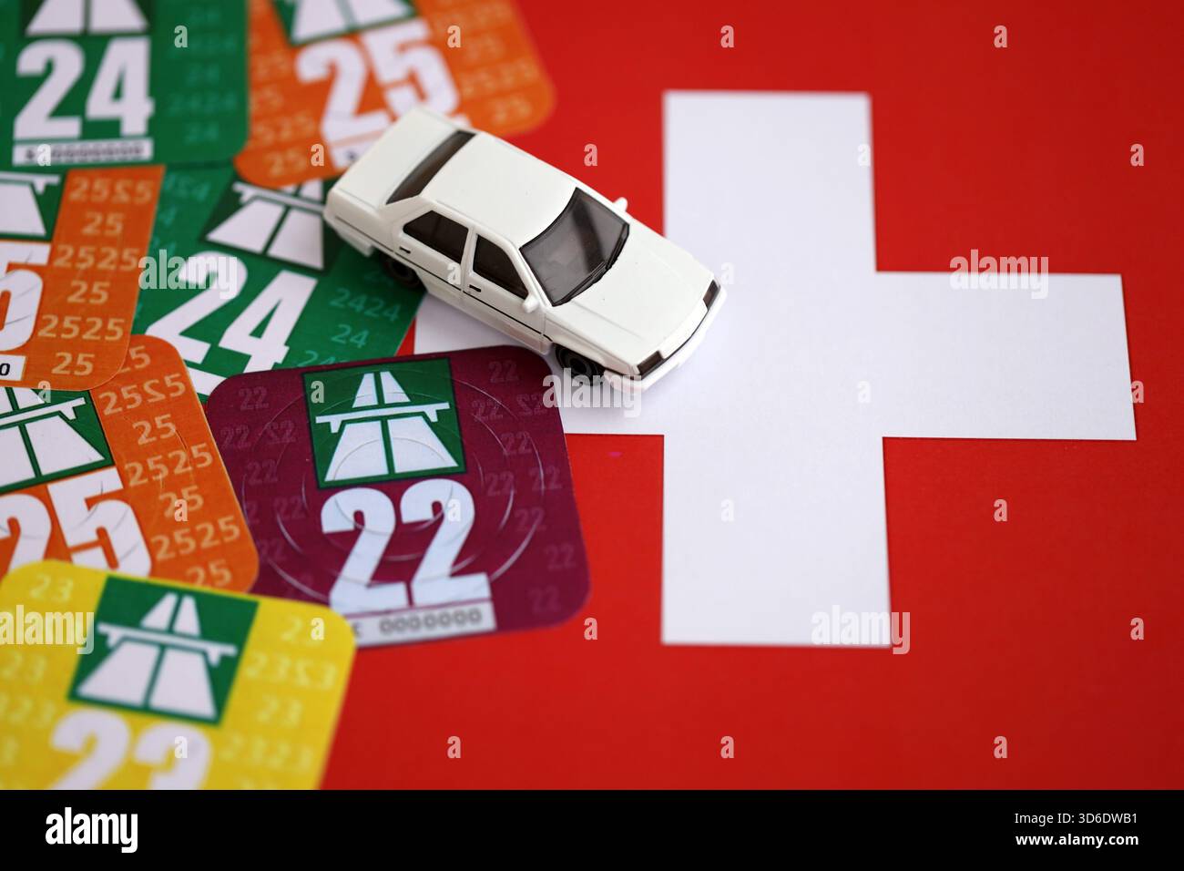 Switzerland vignette stickers for different years with toy car on Swiss ...