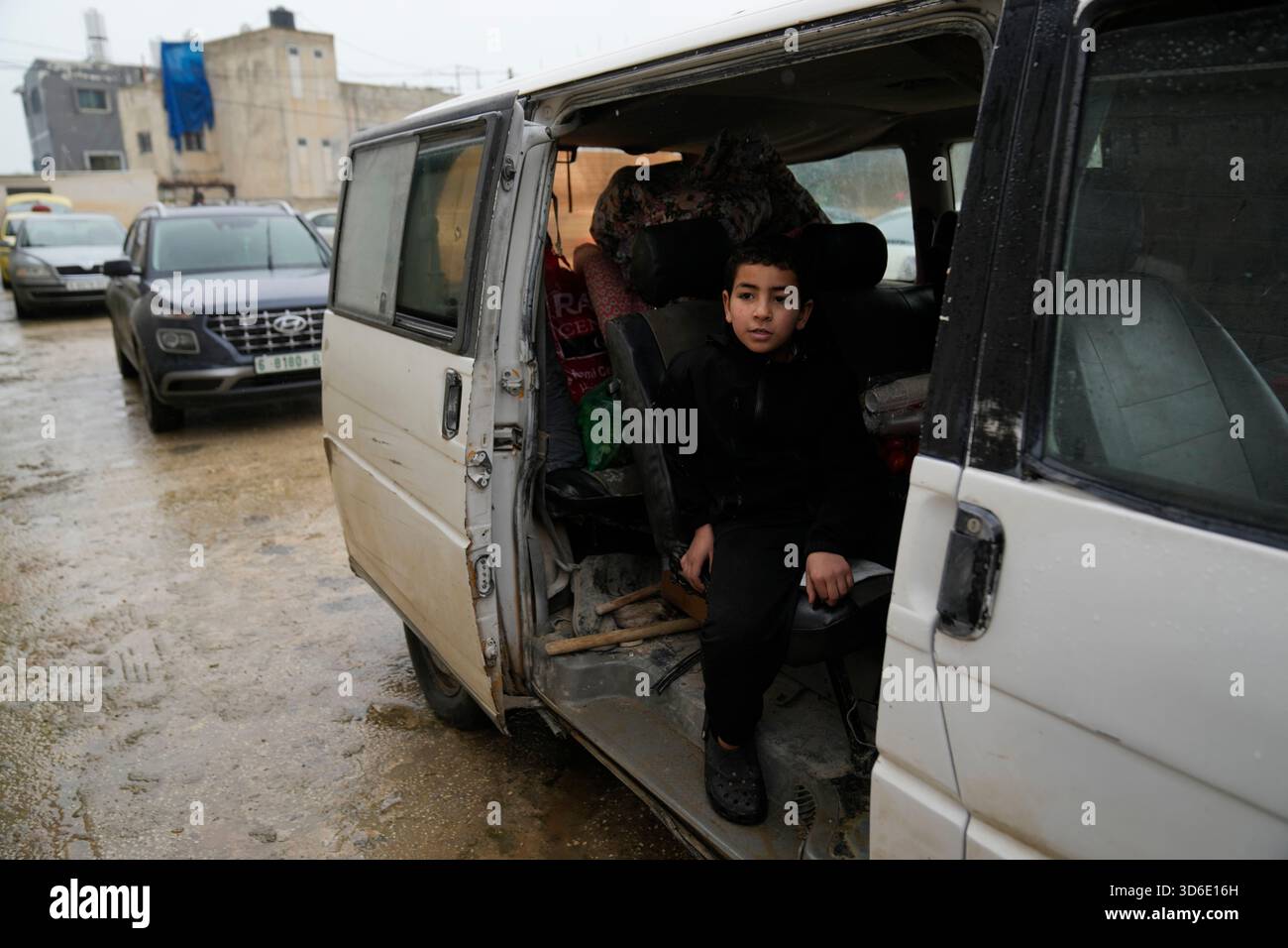 FILE -Palestinians who fled the Israeli military operation in the Nur ...
