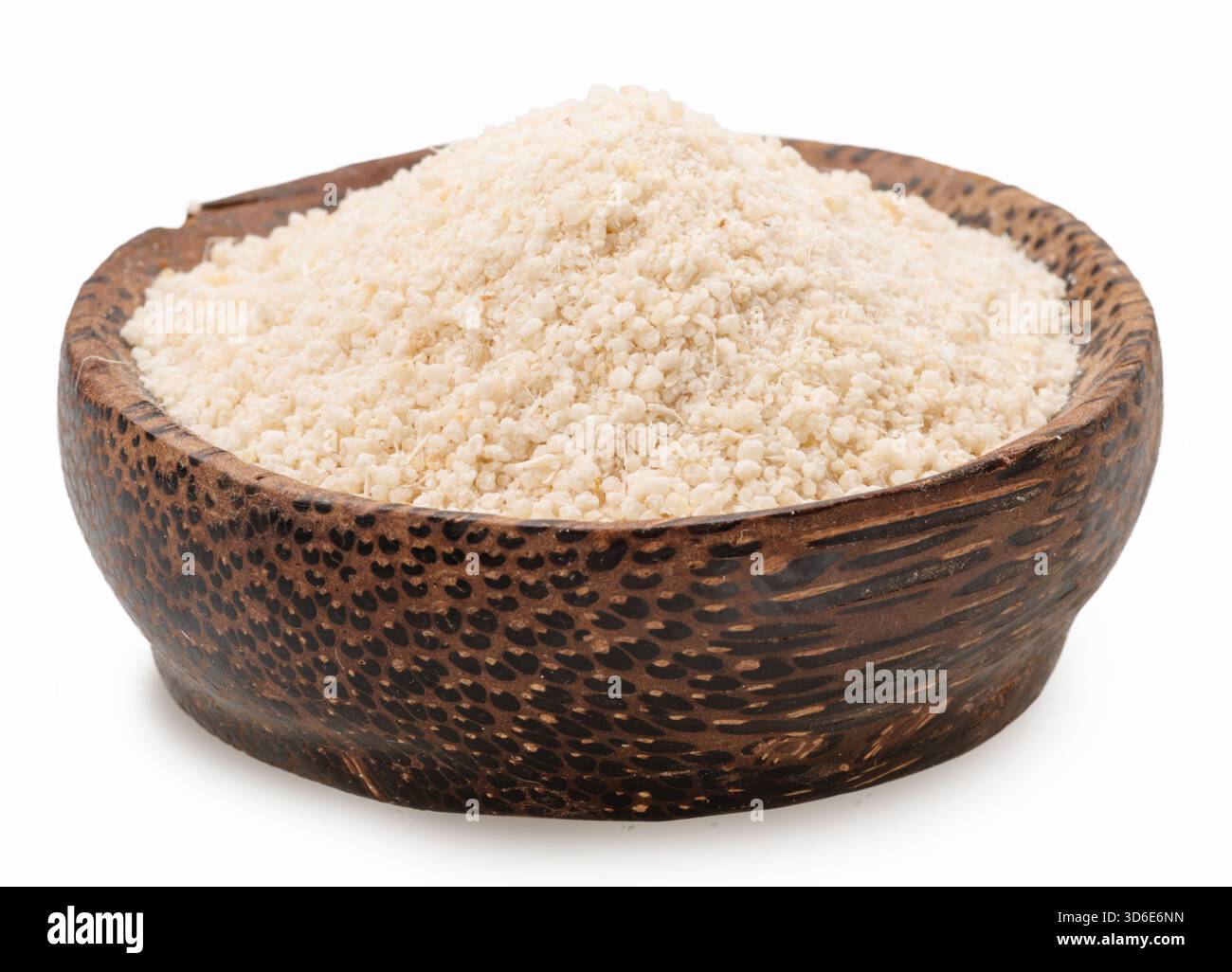 Manioc or cassava flour in wooden bowl on white background. File ...