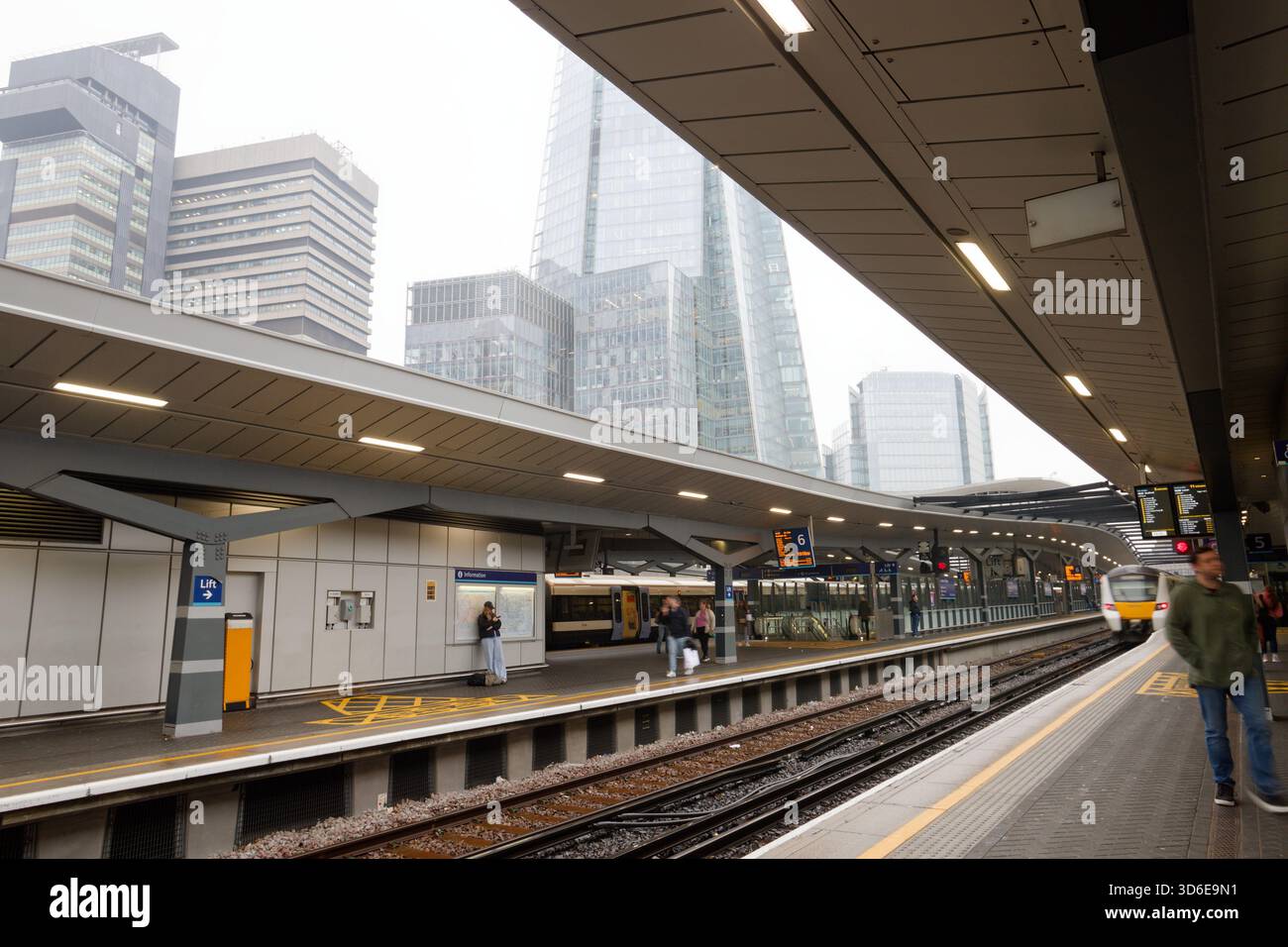 London Bridge Station with The Shard in the background in mist ...
