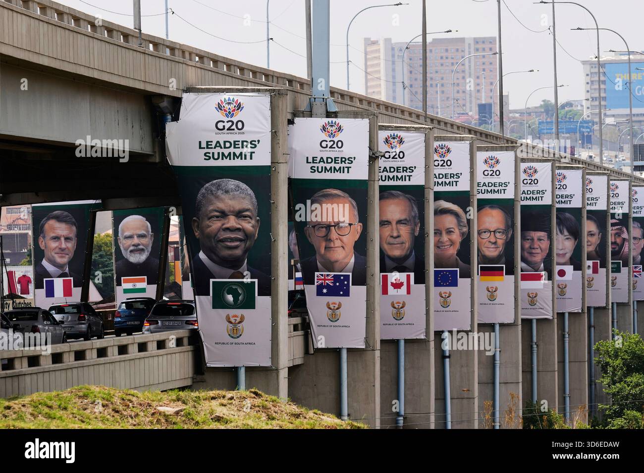 Banners of various G20 leaders are displayed along a Johannesburg ...