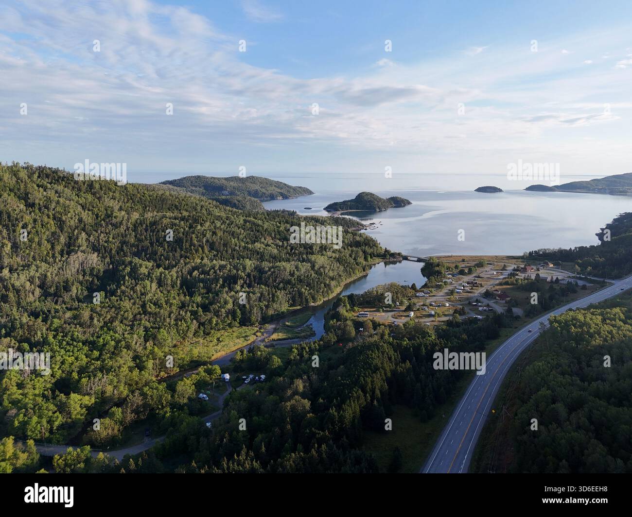 Aerial view of Bic National Park coastline, forest, campground and calm ...
